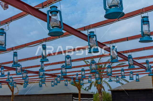 A group of traditional Arabic lamps in Souk Okaz in Taif, old fashioned ...
