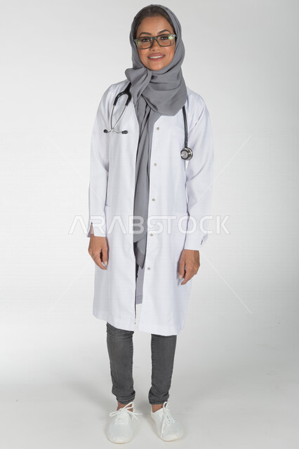 Portrait of a Saudi Arabian Gulf doctor wearing glasses, concept of ...