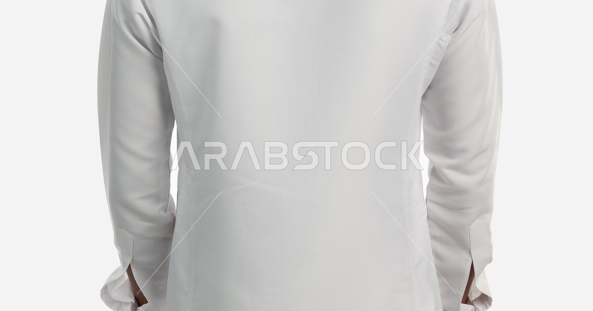 Portrait from the back of a young Saudi Arabian Gulf youth wearing the ...
