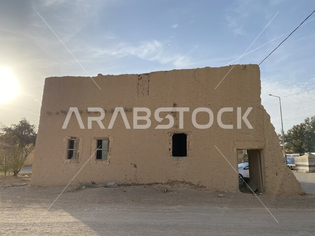 Simple mud houses and buildings in Asir city, a brick house in one of ...