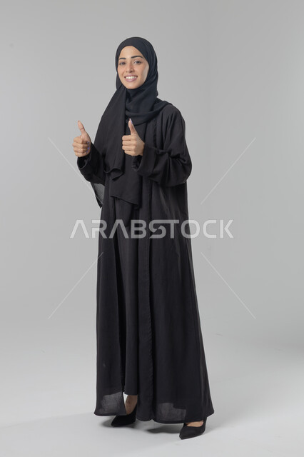 Expressions of approval and acceptance, looking at the camera with ...