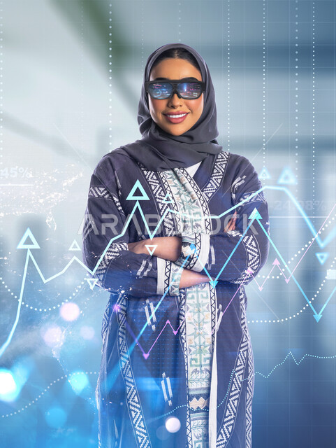 A Saudi Arabian Gulf woman wearing VR 3D glasses, 3D hologram graphics ...