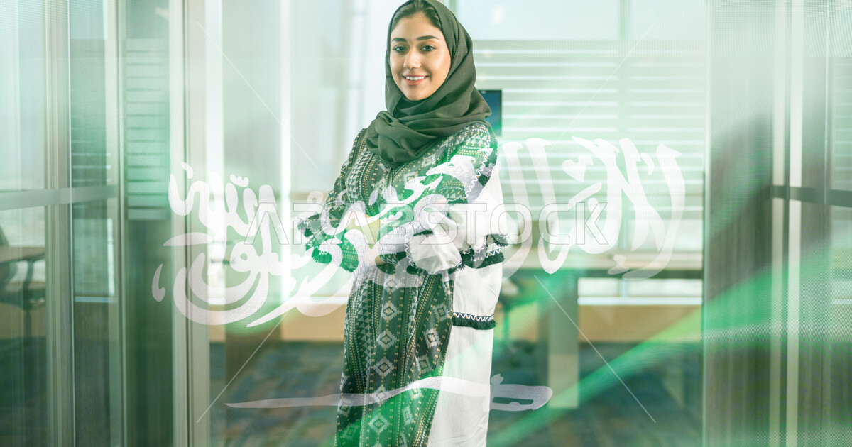 A happy Saudi Arabian Gulf woman inside the company headquarters, a new ...