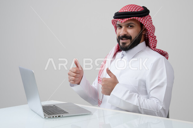 Gestures of admiration and pleasure, portrait of a smiling Saudi ...