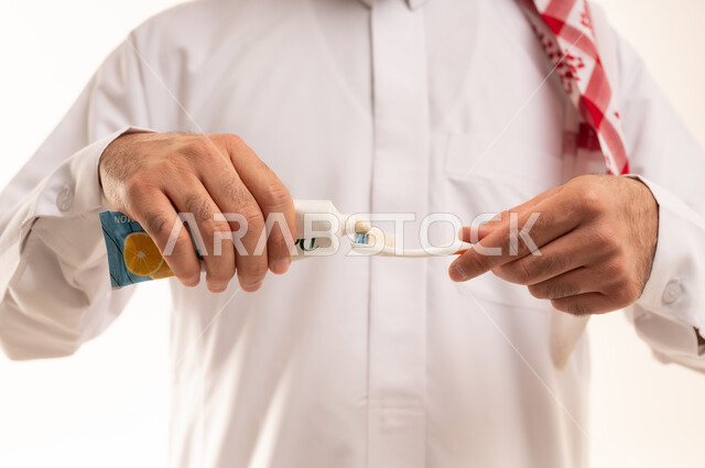 Daily oral and dental hygiene, a close-up portrait of a Saudi Arabian ...