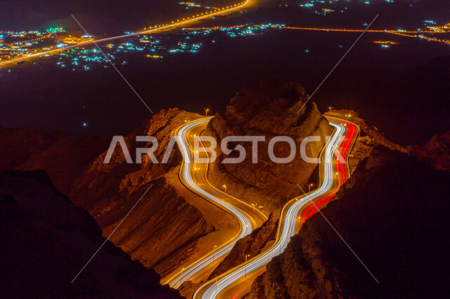 A night view from the top of the Aqabat Al-Hada area in Taif, Saudi ...
