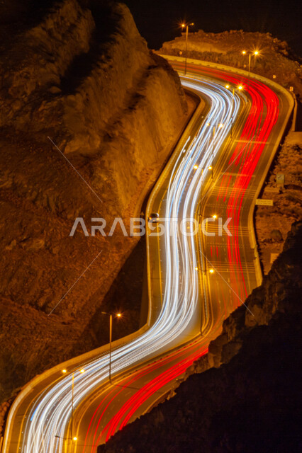 A night view from the top of the Aqabat Al-Hada area in Taif, Saudi ...