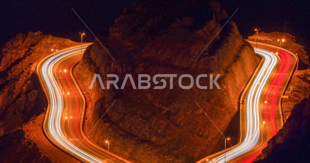 A night view from the top of the Aqabat Al-Hada area in Taif, Saudi ...