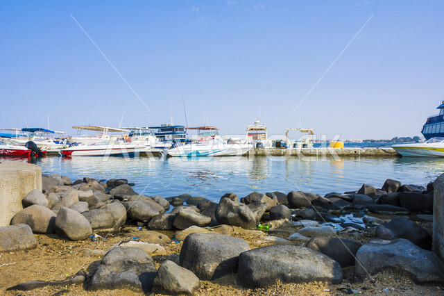 A picture of a group of boats on the beach of Obhur, north of Jeddah in ...