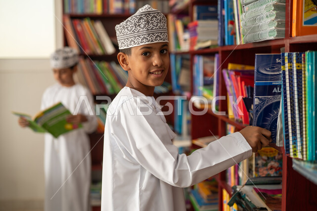 Visiting the school library, love for culture and exploration, an Arab ...