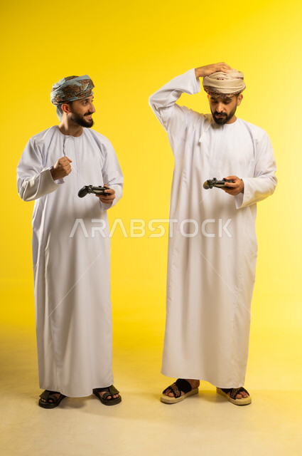 Advanced technology games, a portrait of two Arab Gulf Omani men ...
