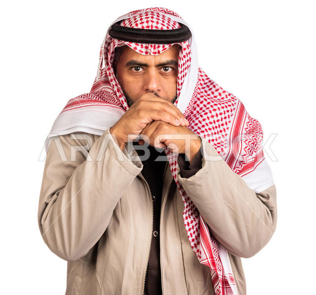 Portrait of a Saudi Arabian Gulf man wearing warm winter clothes and ...