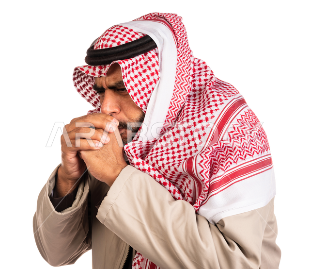 Portrait of a Saudi Arabian Gulf man wearing warm winter clothes and ...