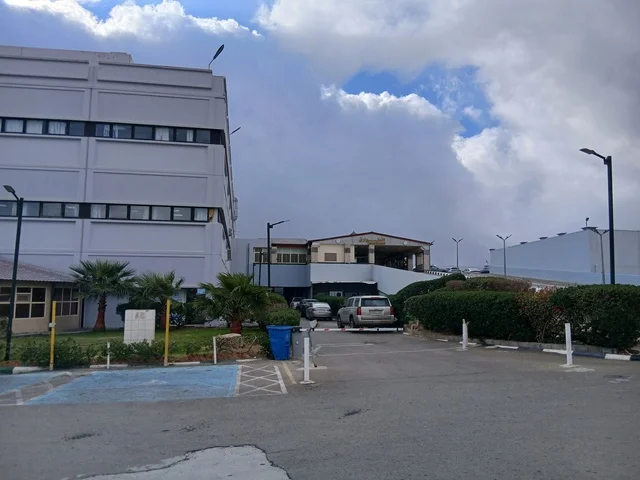 The road to King Fahd Hospital in Al-Baha, the parking lot for medical ...