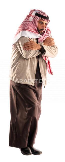 Portrait of a Saudi Arabian Gulf man wearing warm winter clothes and ...