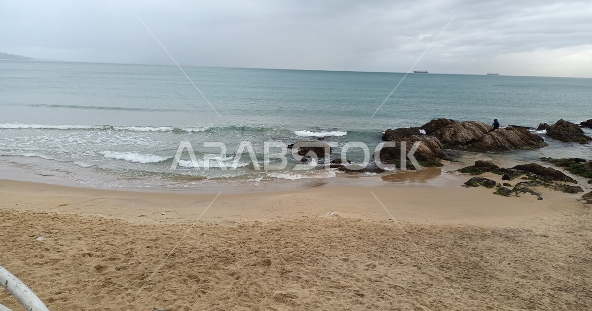 A picture of sea waves on the beach of the city of Jeddah in Saudi ...