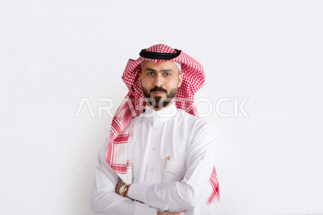 Close-up of a Saudi Arabian Gulf man, a young portrait in traditional ...