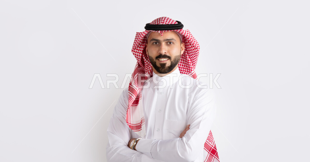 Close-up of a Saudi Arabian Gulf man, a young portrait in traditional ...