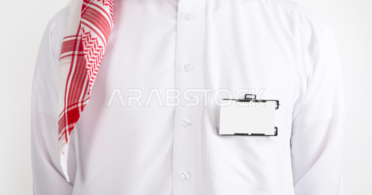 Portrait of a Saudi Arabian man with an ID card on the chest, white ...