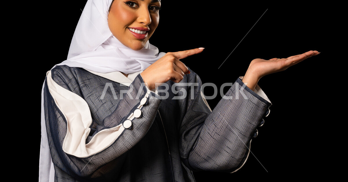 Portrait of a happy Saudi Arabian Gulf Arab woman showing an expression ...