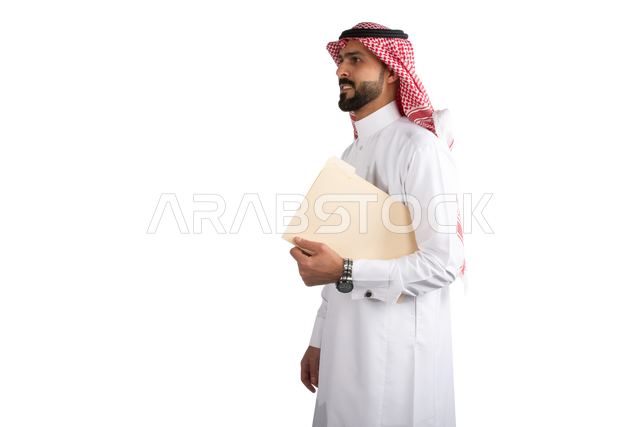 Portrait of a Saudi Arabian Gulf male smiling with a yellow file ...