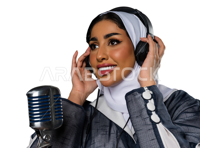 Portrait of a Saudi Arabian Gulf woman in an audio studio, presenting ...