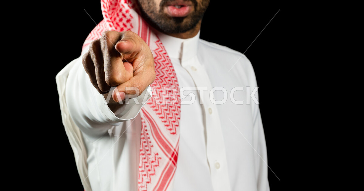 A Saudi Arabian Gulf man in a Saudi dress, gestures of the face and ...