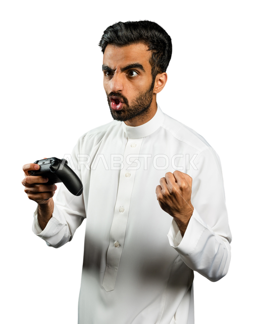 A young Saudi Arabian Gulf man wearing a Saudi outfit, holding a ...