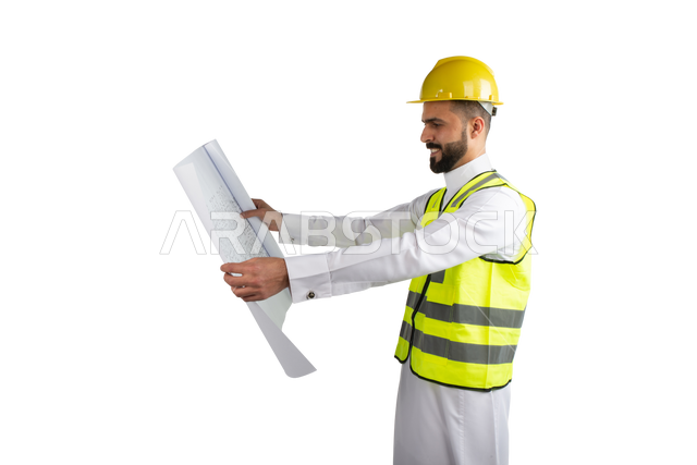 Portrait, Saudi Arabian engineer, skilled engineer in blueprints, Gulf ...