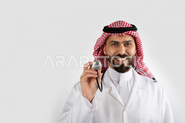 Portrait of a Saudi Arabian doctor, with a stethoscope, white ...