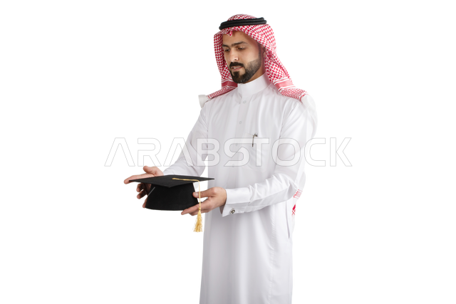 Happy Saudi Arabian graduate with graduation certificate, young ...