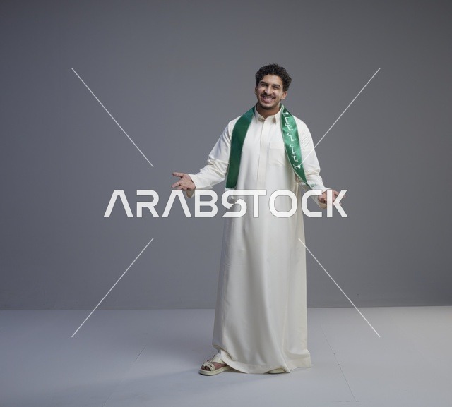 Saudi Man in Traditional Thobe and National Scarf - Photo