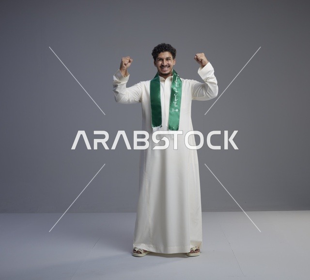 Saudi Man in Thobe Celebrating National Day - Photo