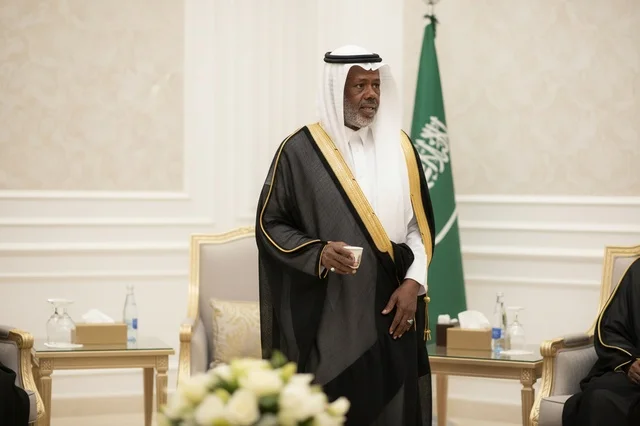 Saudi Man in Traditional Attire Playing Oud Indoors - Photo