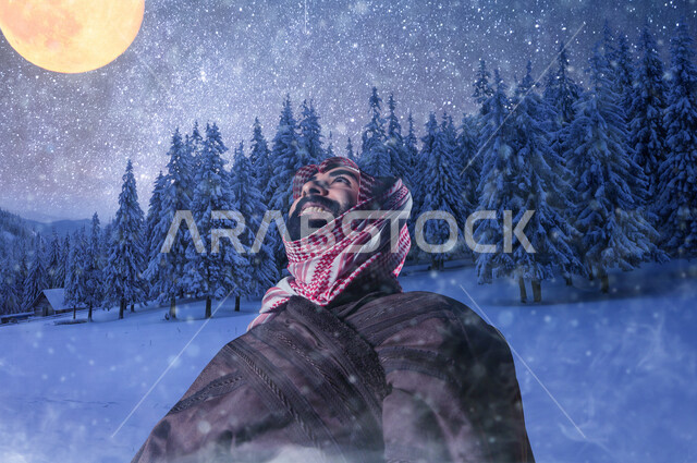 A Saudi Arabian Gulf man enjoying the winter weather in the Kingdom of ...