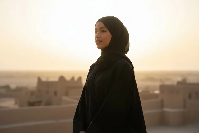 Saudi Woman in Abaya at AlUla Desert Rock - Photo