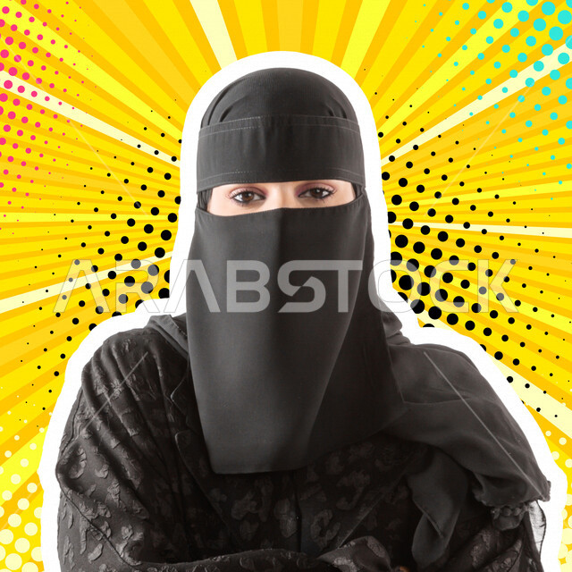 A veiled Saudi Arabian Gulf woman wearing the niqab and abaya, using ...