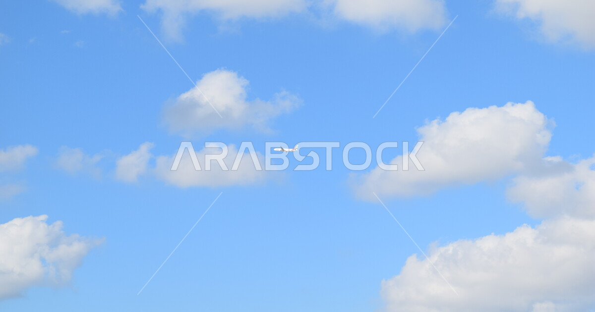 Emirates plane flying in the sky of Dubai, United Arab Emirates, Dubai ...