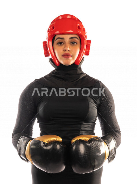 Portrait of a veiled Saudi Arabian Gulf woman in the women's boxing ...