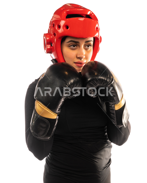 Portrait of a veiled Saudi Arabian Gulf woman in the women's boxing ...