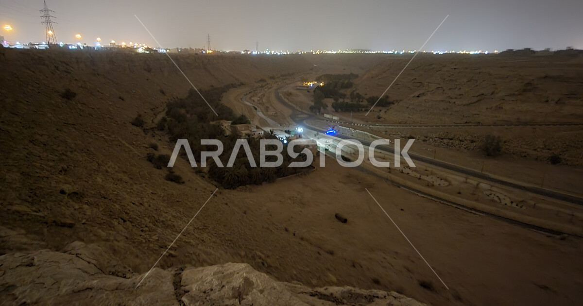 Night view of a valley in Riyadh, Saudi Arabia, mountain heights ...