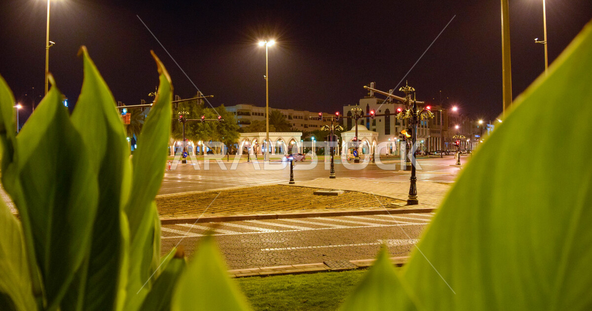 Night picture of the intersection of streets in the city of Al Ain in ...