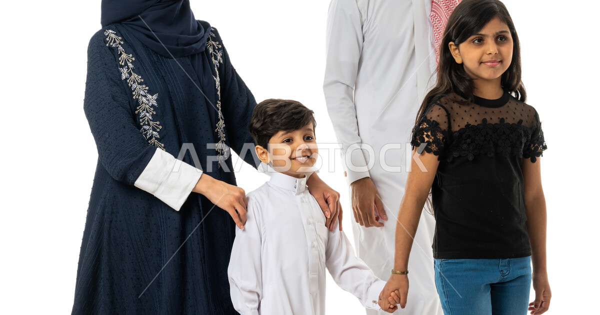 Portrait of a happy and smiling Saudi Arabian Gulf family, touring and ...