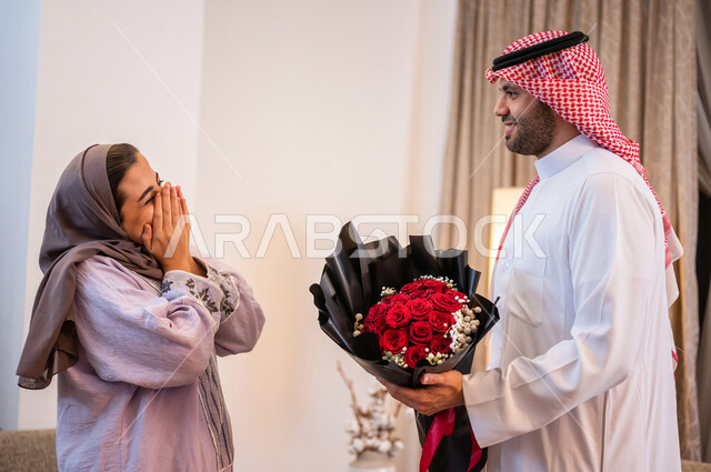 A happy Saudi Arabian Gulf couple celebrate Valentine's Day, a husband ...