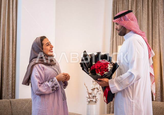 A happy Saudi Arabian Gulf couple celebrate Valentine's Day, a husband ...