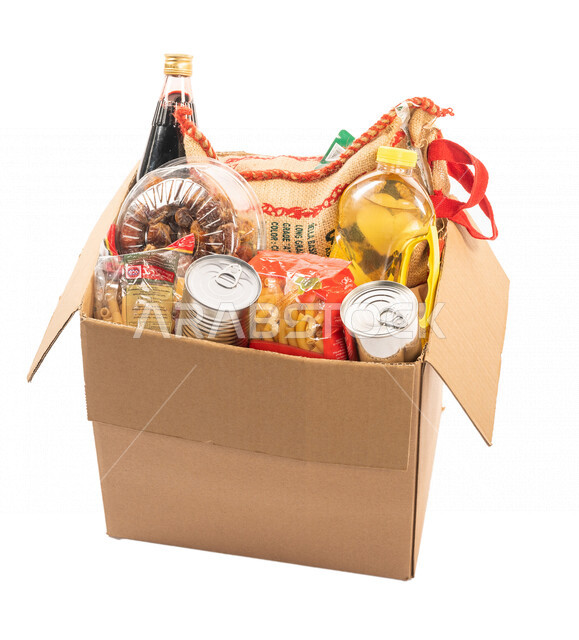 A parcel containing basic food ingredients, donation to the food basket ...