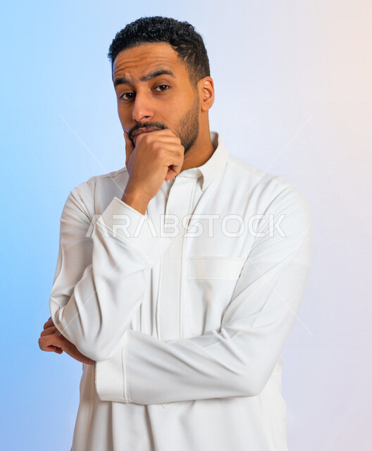 Portrait of a Saudi Arabian Gulf man making facial and hands gestures ...