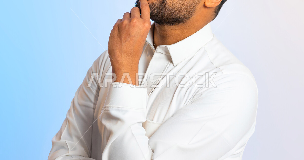 Portrait of a Saudi Arabian Gulf man making facial and hands gestures ...