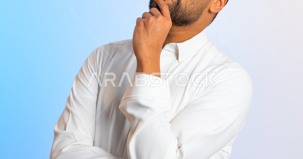 Portrait of a Saudi Arabian Gulf man making facial and hands gestures ...