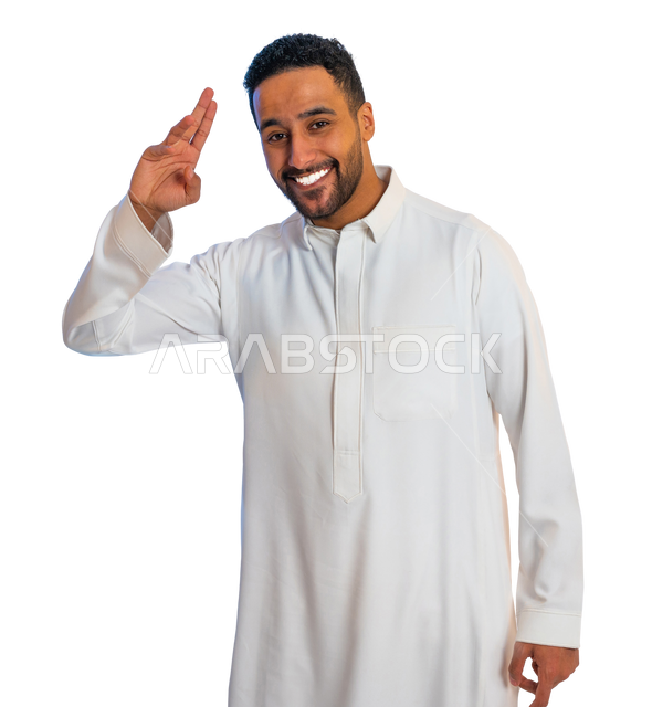 Portrait of a smiling and happy Saudi Arabian Gulf youth with gestures ...